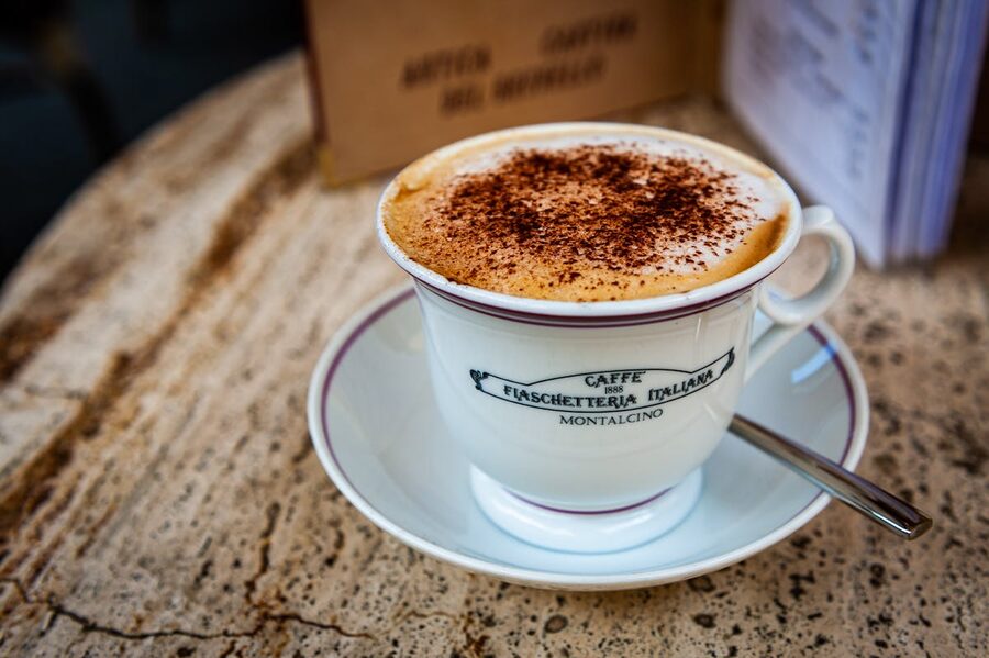 Cappuccino in white cup served in a traditional Italian cafe