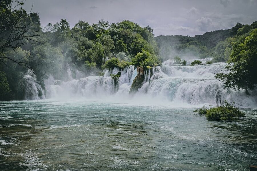 Breathtaking view of the Krka waterfalls amidst lush forest