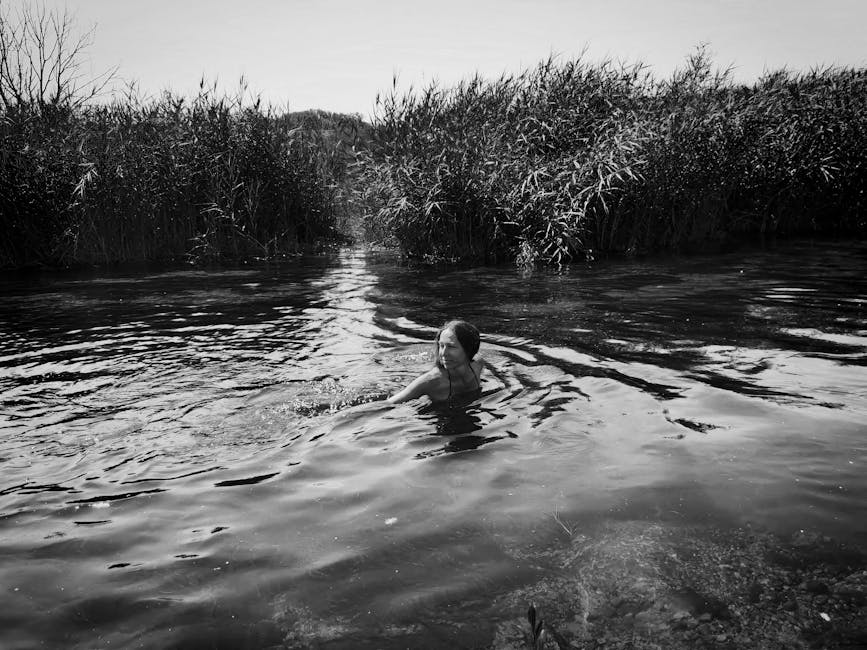 Traveler swimming in natural pool in Croatia