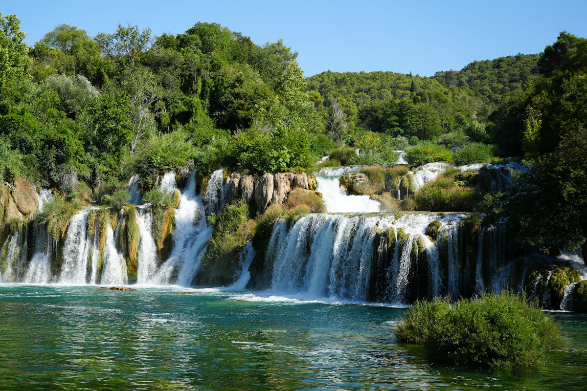 Cascading waterfalls in lush Krka National Park Croatia