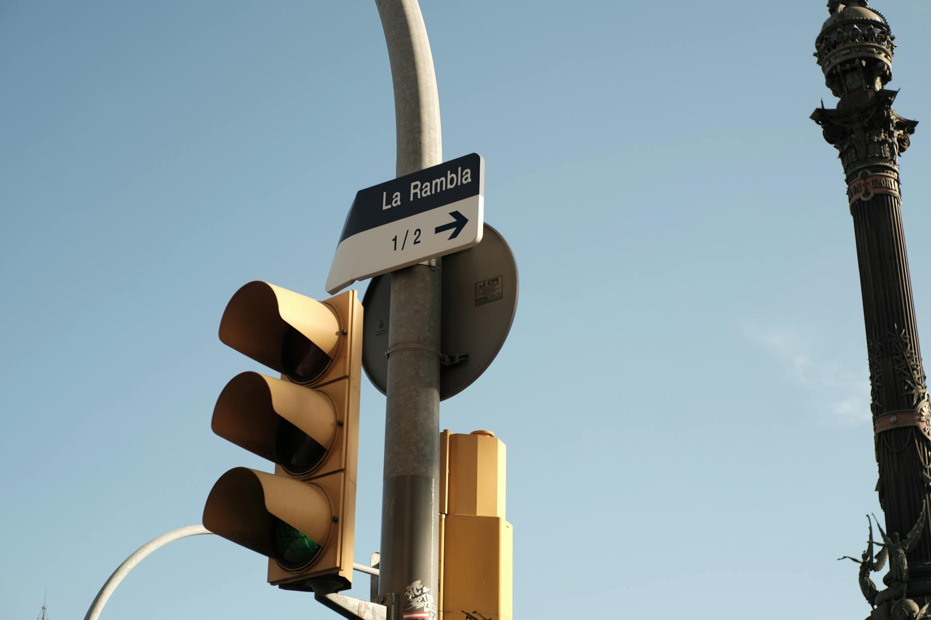 La Rambla street sign in Barcelona with traffic lights