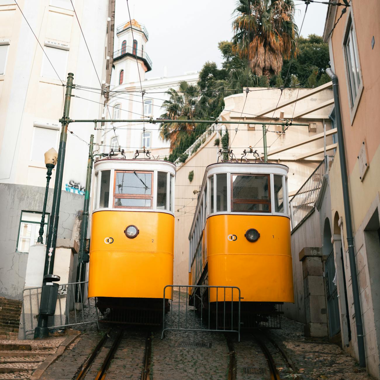 Colorful street in Bairro Alto district of Lisbon with traditional Portuguese architecture