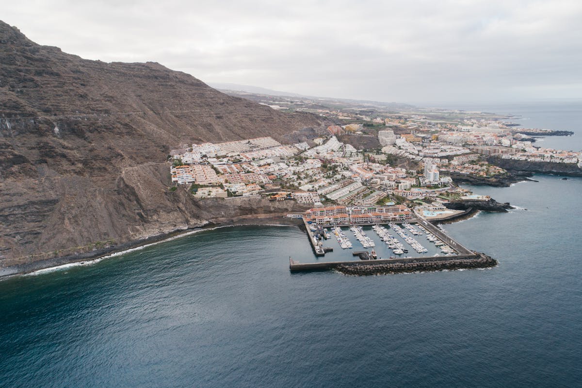 Aerial view of Los Gigantes marina with cliffside