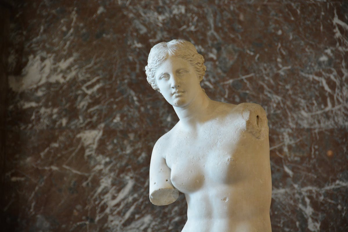 The Venus de Milo sculpture displayed at the Louvre Museum in Paris