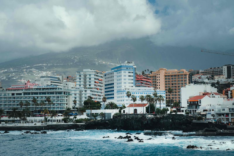 Scenic coastal view of Puerto de la Cruz Spain with cityscape and ocean