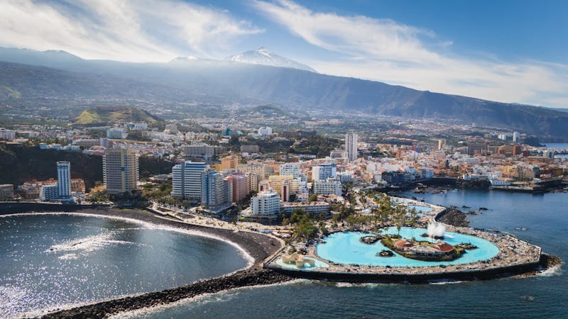 Aerial view of Puerto de la Cruz with Mount Teide in the distance Tenerife