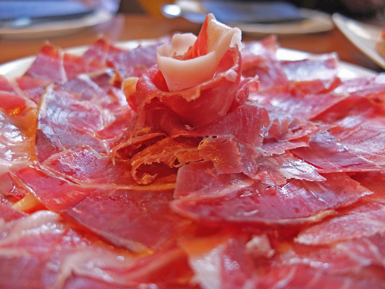 Jamon iberico Spanish cured ham on tapas plate