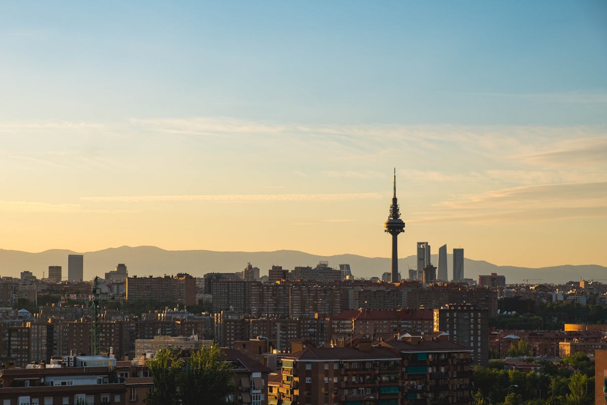 Sunset over Madrid skyline with urban architecture