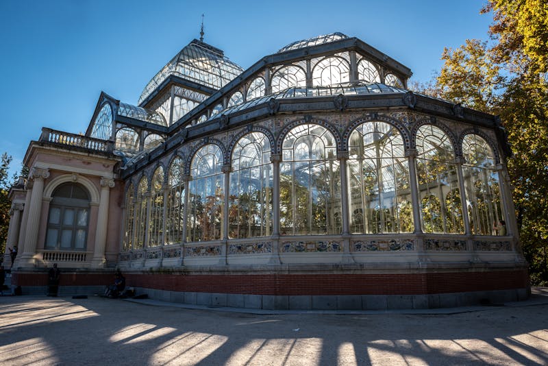 Palacio de Cristal glass architecture in Retiro Park Madrid