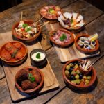 Traditional Spanish tapas served on rustic wooden boards
