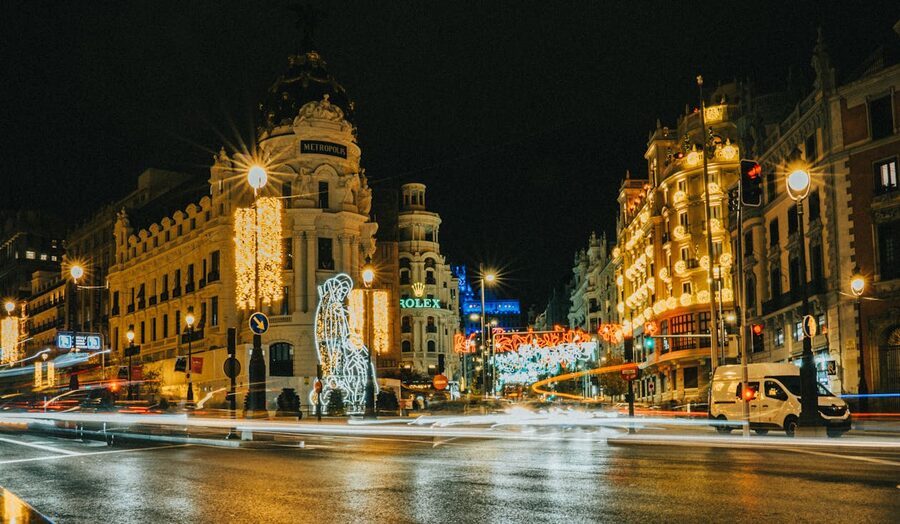 Gran Via in Madrid decorated with festive lights at night
