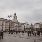 Busy Puerta del Sol square in Madrid with crowds of tourists and locals