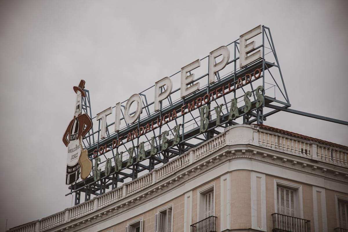The iconic Tio Pepe neon advertising sign overlooking Puerta del Sol square in Madrid