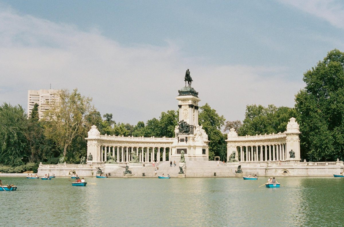 Rowing boats near Alfonso XII monument Retiro Park