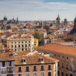 Aerial view of Madrid historic rooftops with iconic architectural landmarks
