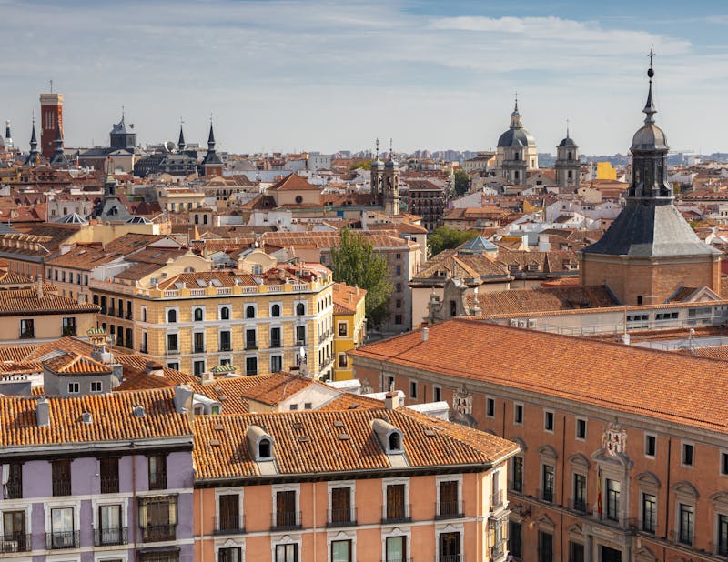 Aerial view of Madrid historic rooftops with iconic architectural landmarks