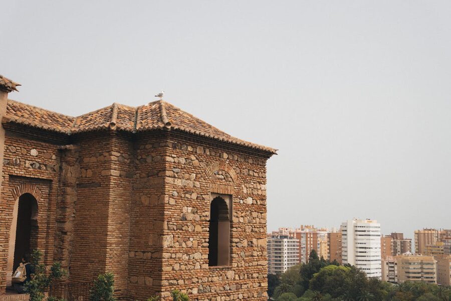 The Alcazaba fortress with M&aacute;laga's modern cityscape stretching out behind it