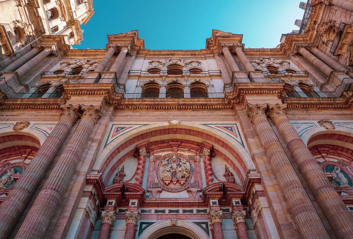 Low angle view of ornate facade of Malaga Cathedral