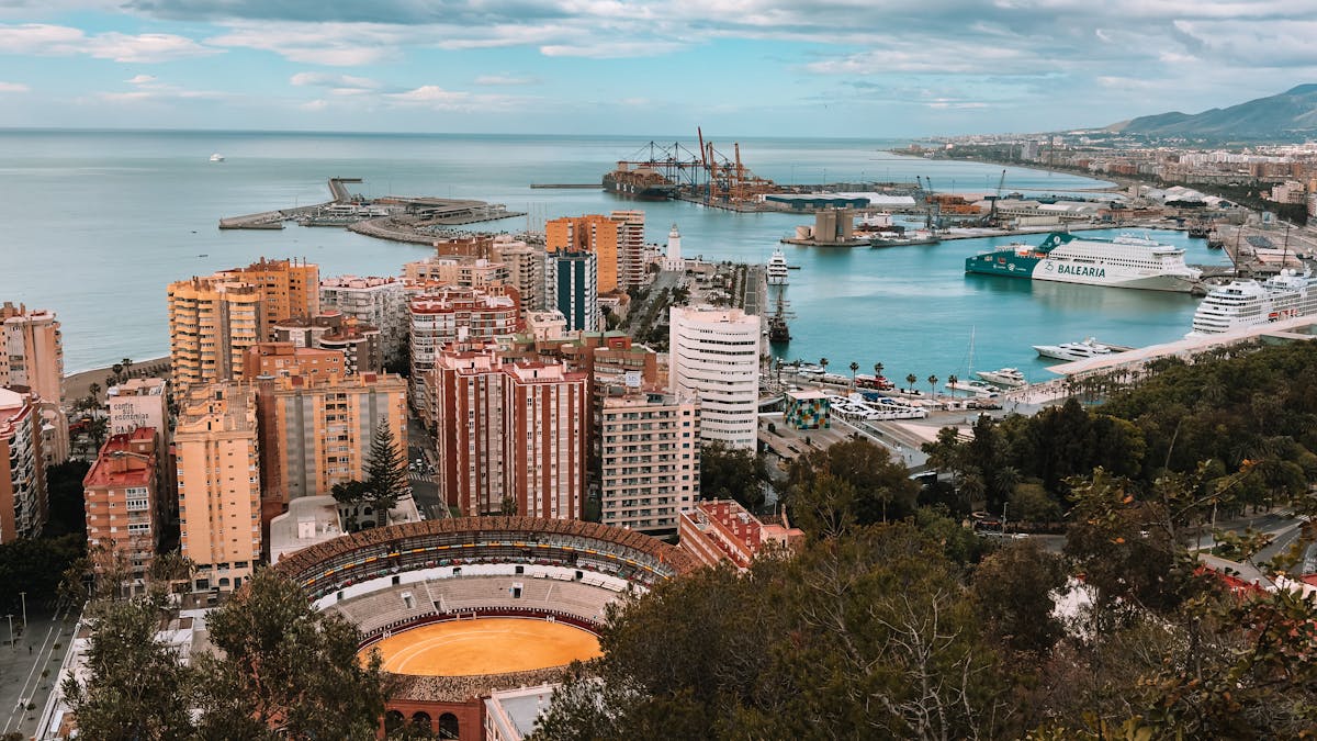 Stunning aerial view of Malaga cityscape and harbor