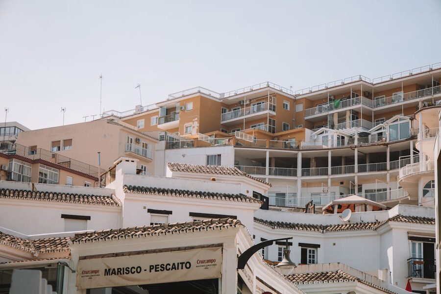 Low angle view of residential building with iron balconies in Malaga Spain