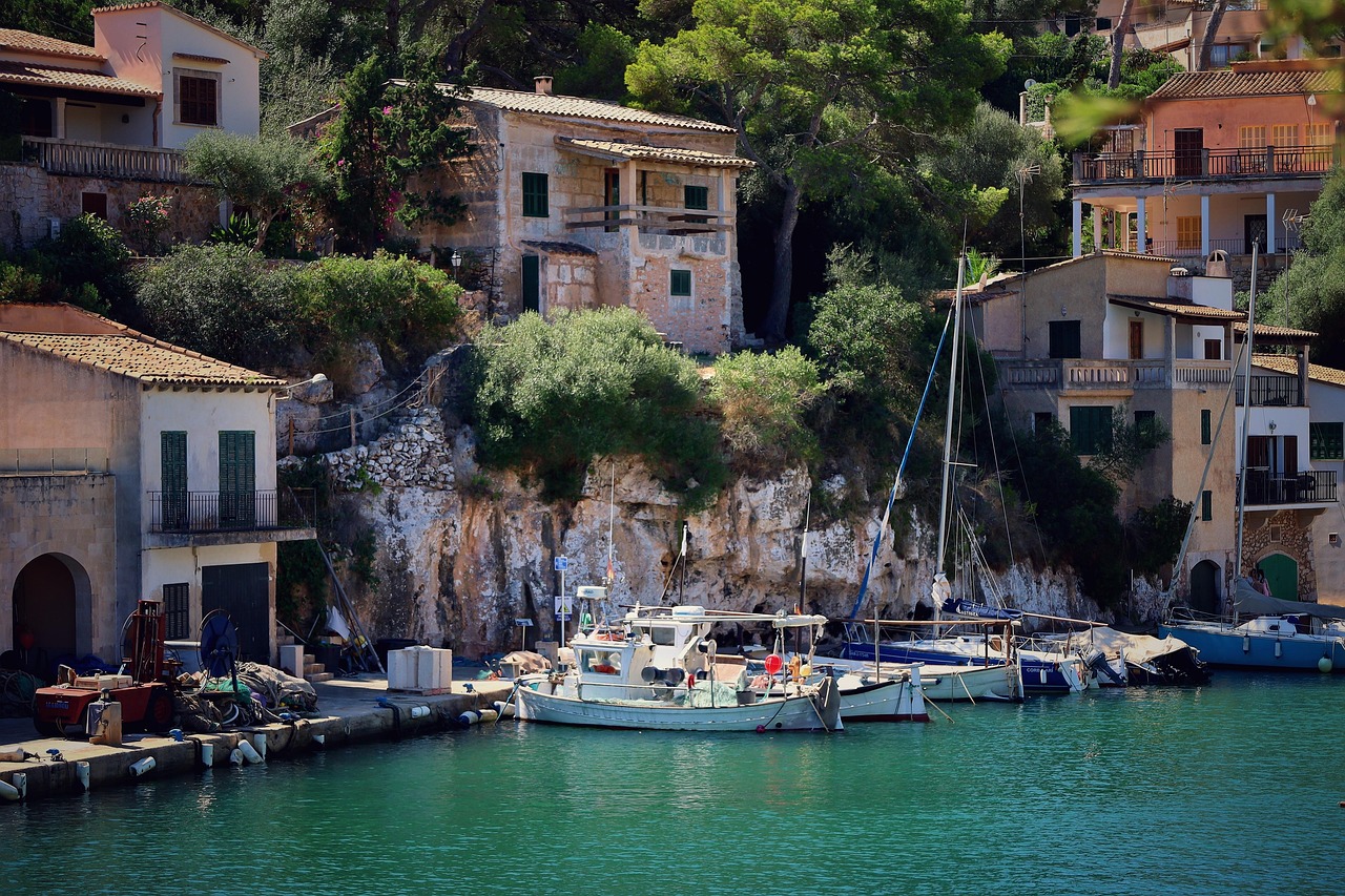 Traditional fishing village harbour with boats in Mallorca