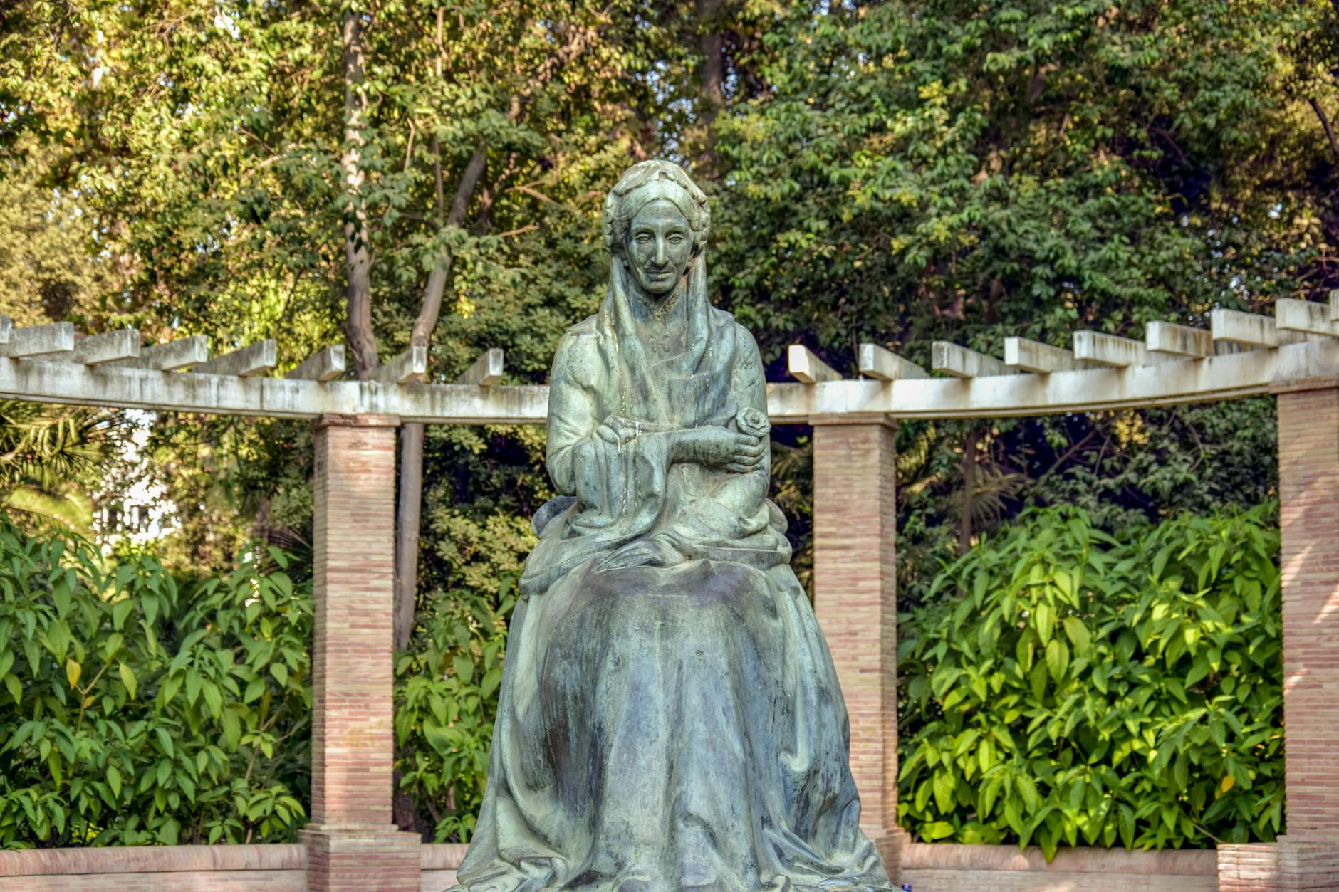 Bronze statue of Infanta Maria Luisa in garden in Seville