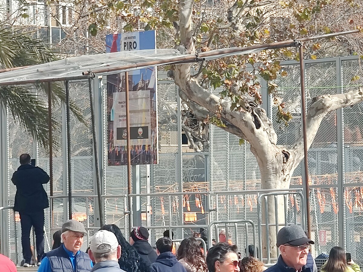 Smoke and explosions fill Plaza del Ayuntamiento during the daily mascleta at Las Fallas 2023