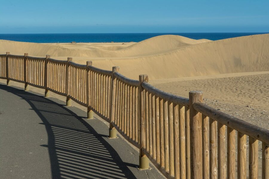 Wooden walkway path through the sand dunes of Maspalomas