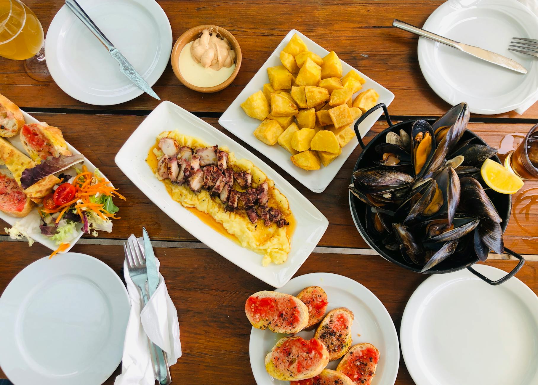 Mediterranean seafood dishes at a Spanish restaurant