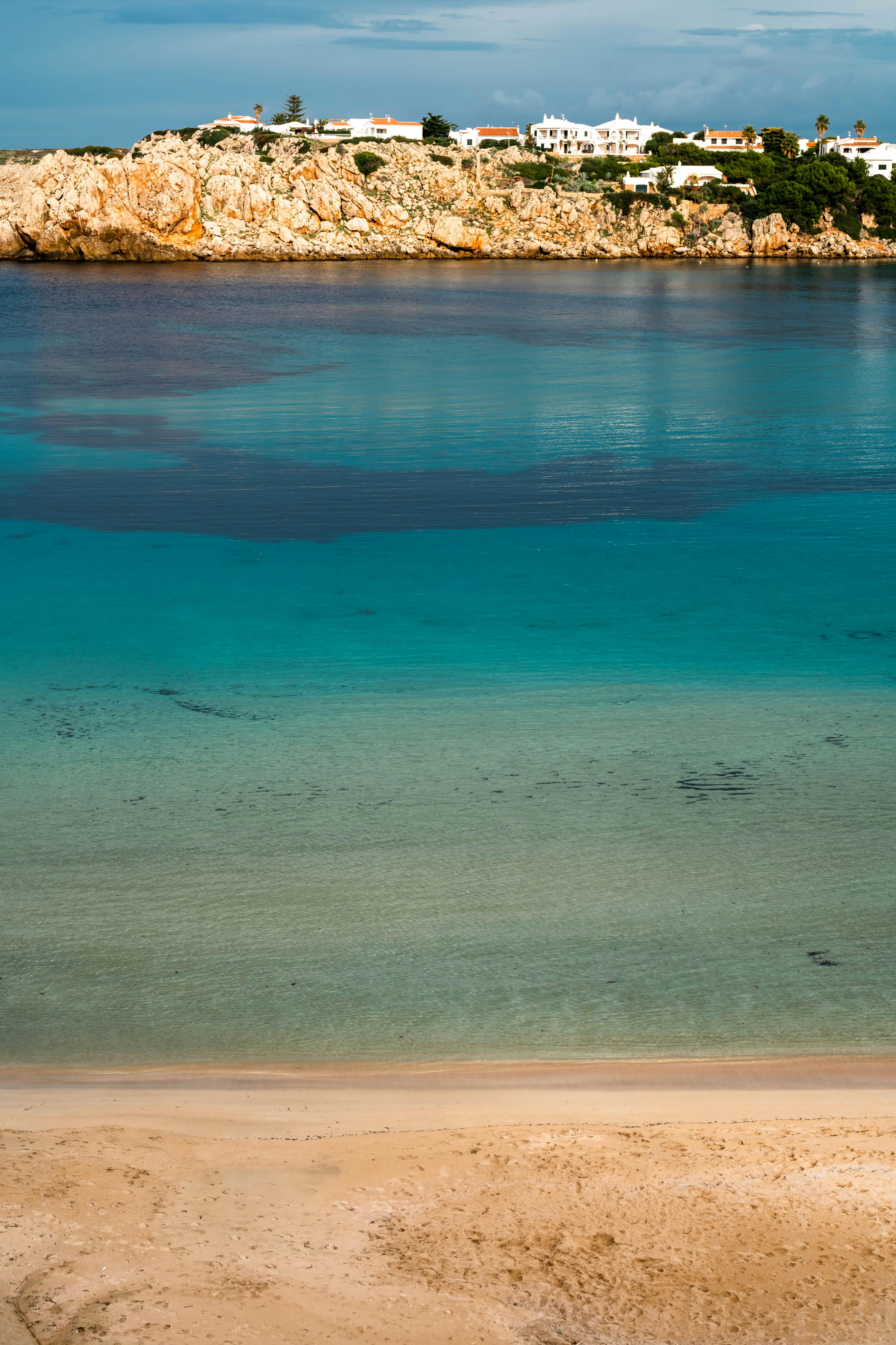 Sandy beach and turquoise Mediterranean sea in Menorca