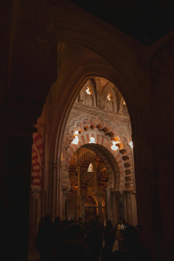 Close-up of the iconic double horseshoe arches inside the Mezquita in Cordoba