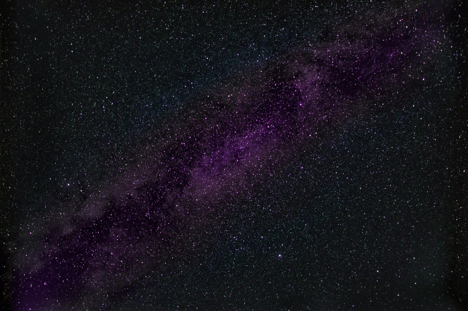 Clear view of the Milky Way band stretching across the dark sky