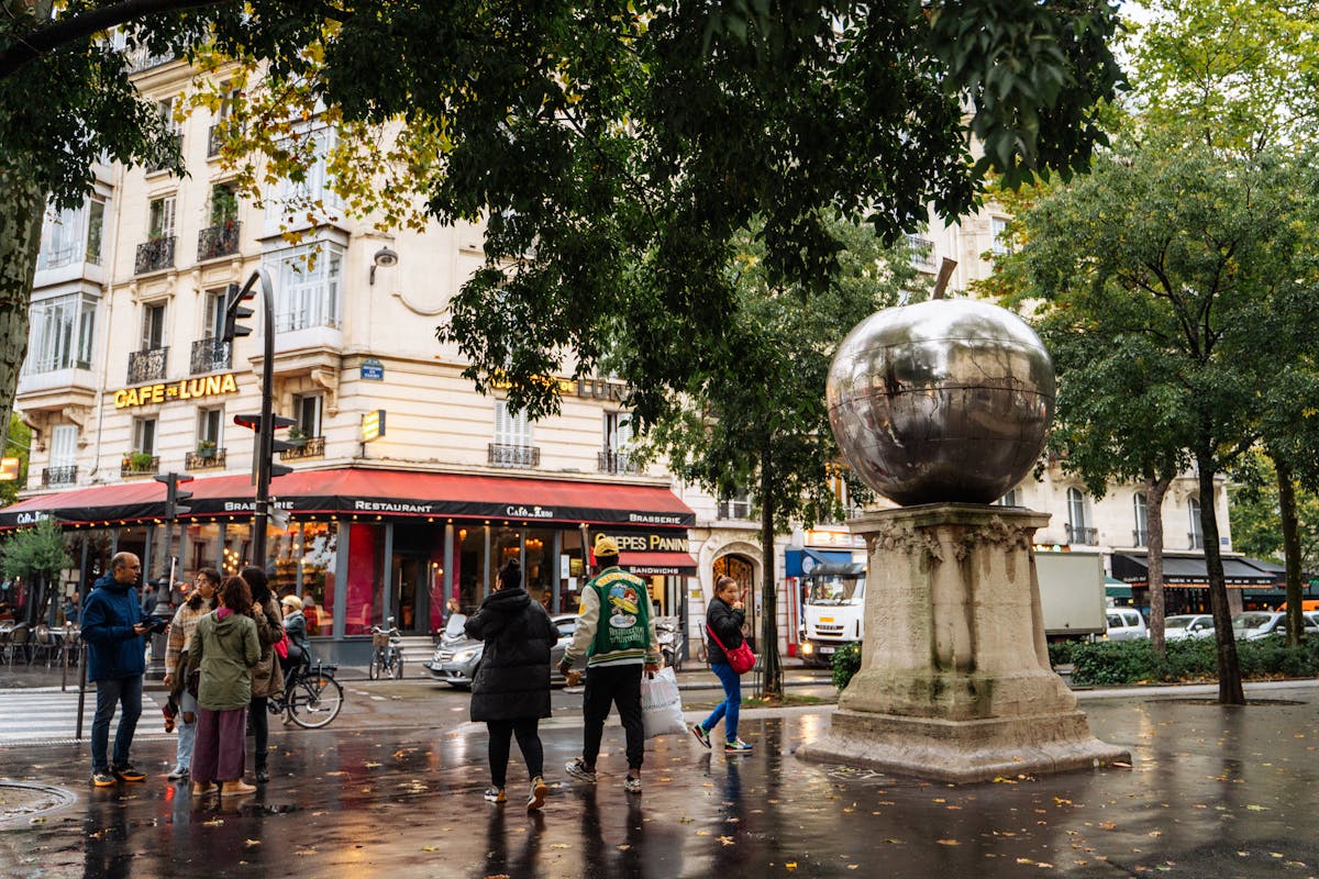 A lively Paris street cafe in the Montmartre neighborhood