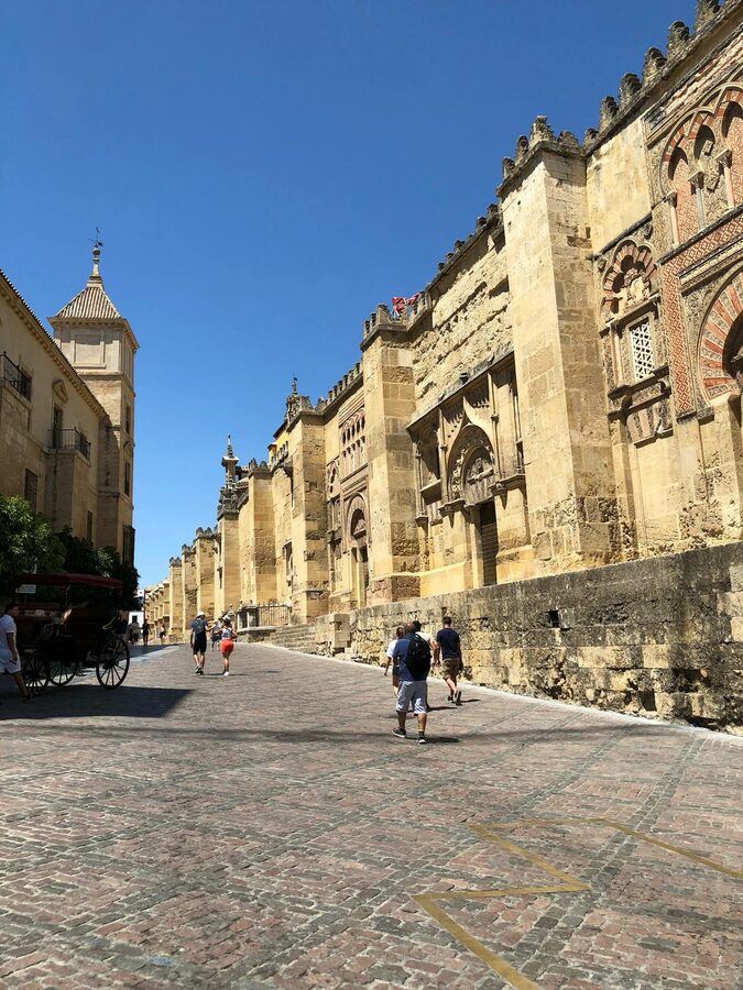 Exterior wall of the Mosque-Cathedral of Cordoba on a sunny day