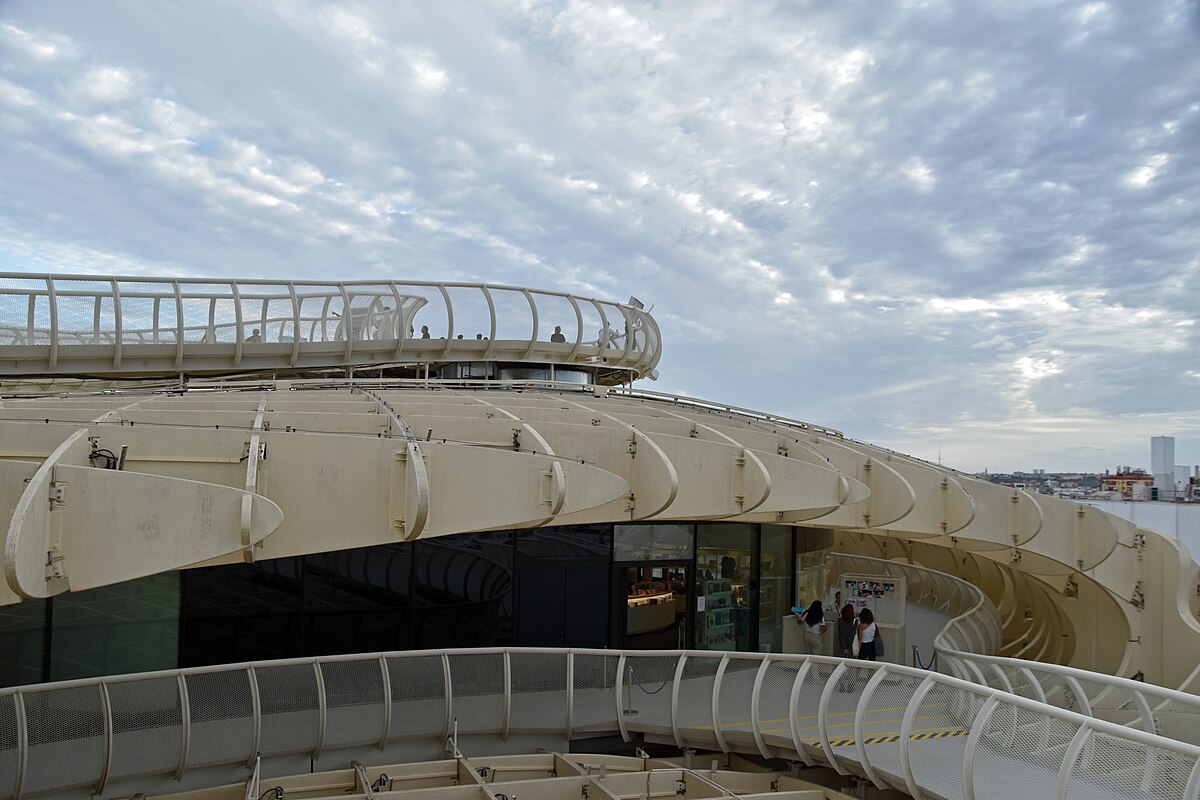 Looking up at the wooden lattice structure of Metropol Parasol in Seville