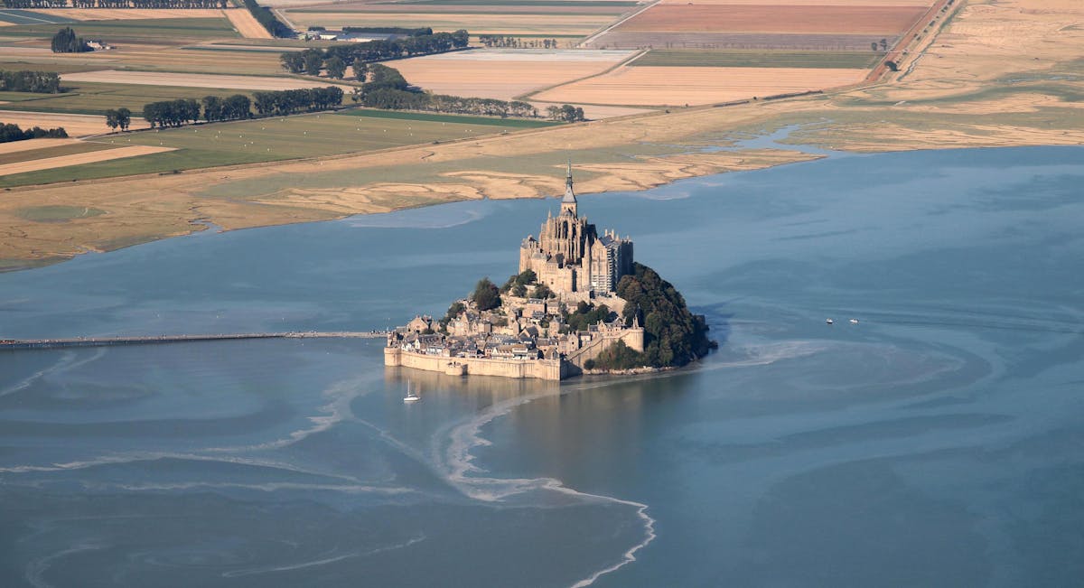 Stunning aerial view of Mont-Saint-Michel in Normandie, a famous UNESCO World Heritage site
