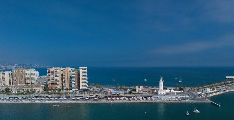 Panoramic aerial view of Muelle Uno marina and waterfront promenade in Malaga
