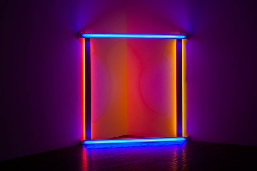 Colorful neon light installation creating a modern abstract art piece in an indoor room