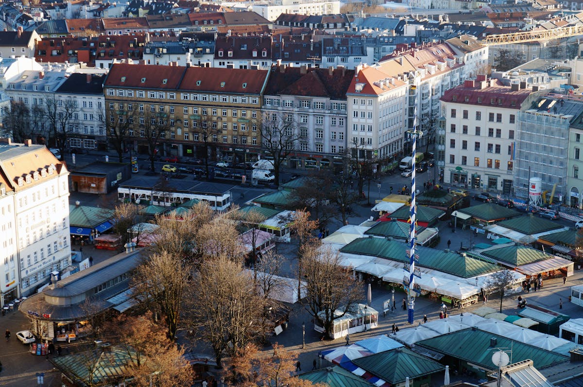 Viktualienmarkt outdoor market in Munich city center with traditional architecture
