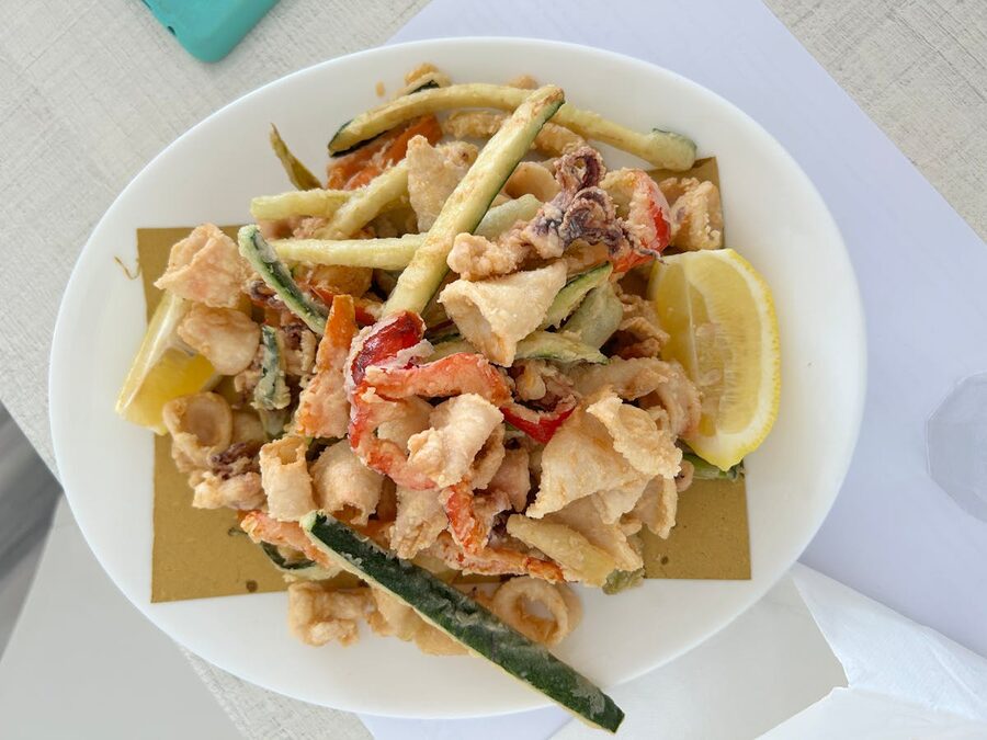 Mixed fried seafood platter with calamari and fish in traditional Italian style