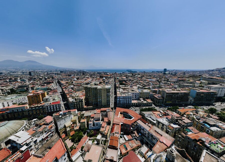 Aerial panoramic view of Naples city with Mount Vesuvius volcano in the background