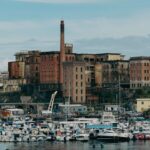 Historic port of Naples with colorful buildings along the waterfront