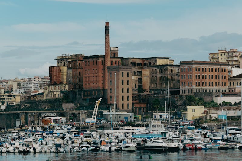 Historic port of Naples with colorful buildings along the waterfront