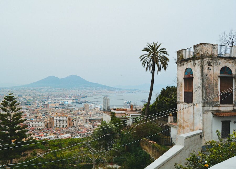 Panoramic view of Naples cityscape with Mount Vesuvius and historic architecture