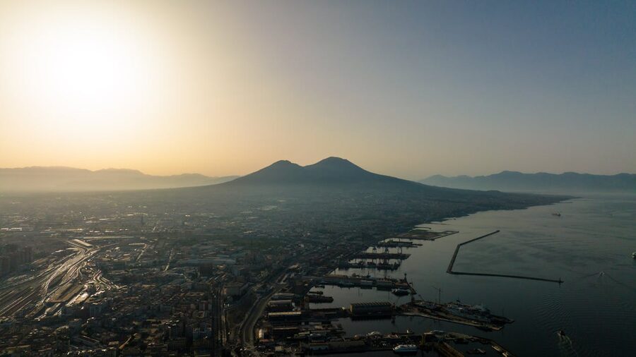 Aerial view of Mount Vesuvius at sunrise over the city of Naples Italy