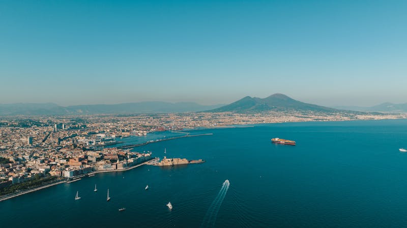 Stunning coastline view of Naples with Mount Vesuvius visible in the distance