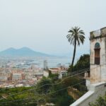 View of Naples with Mount Vesuvius and historic buildings in the foreground