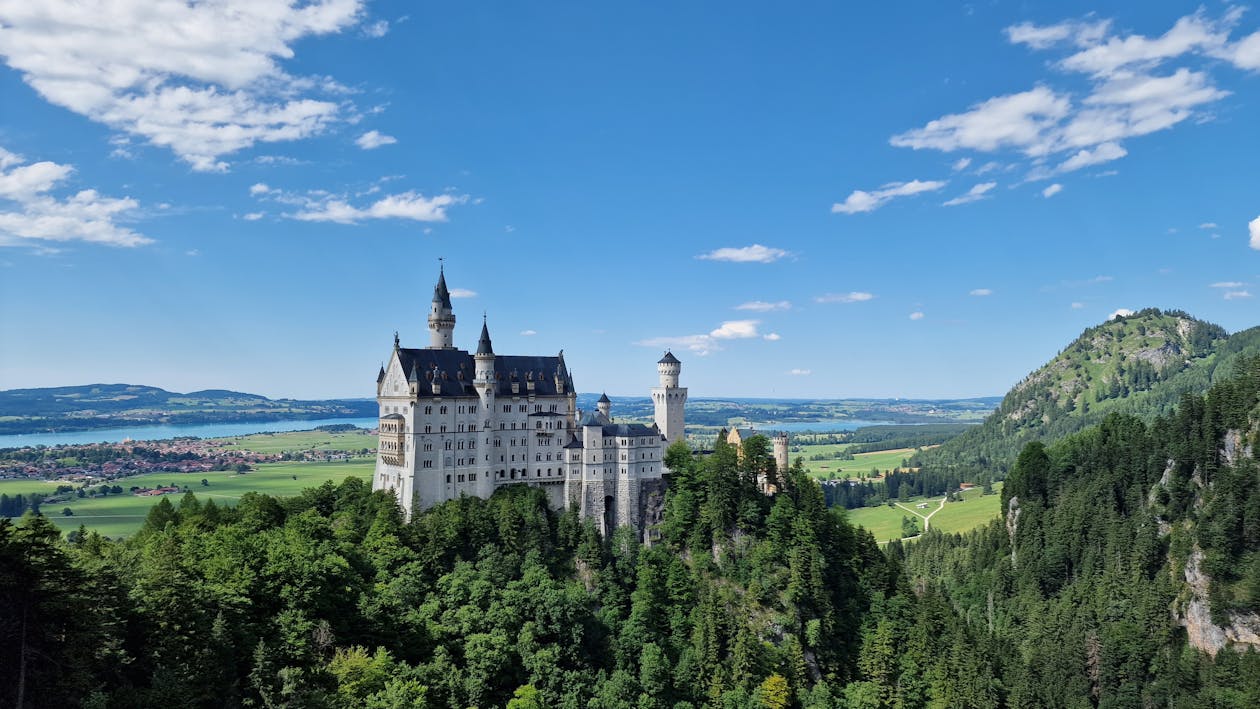Neuschwanstein Castle with dramatic mountain backdrop in the Bavarian Alps region