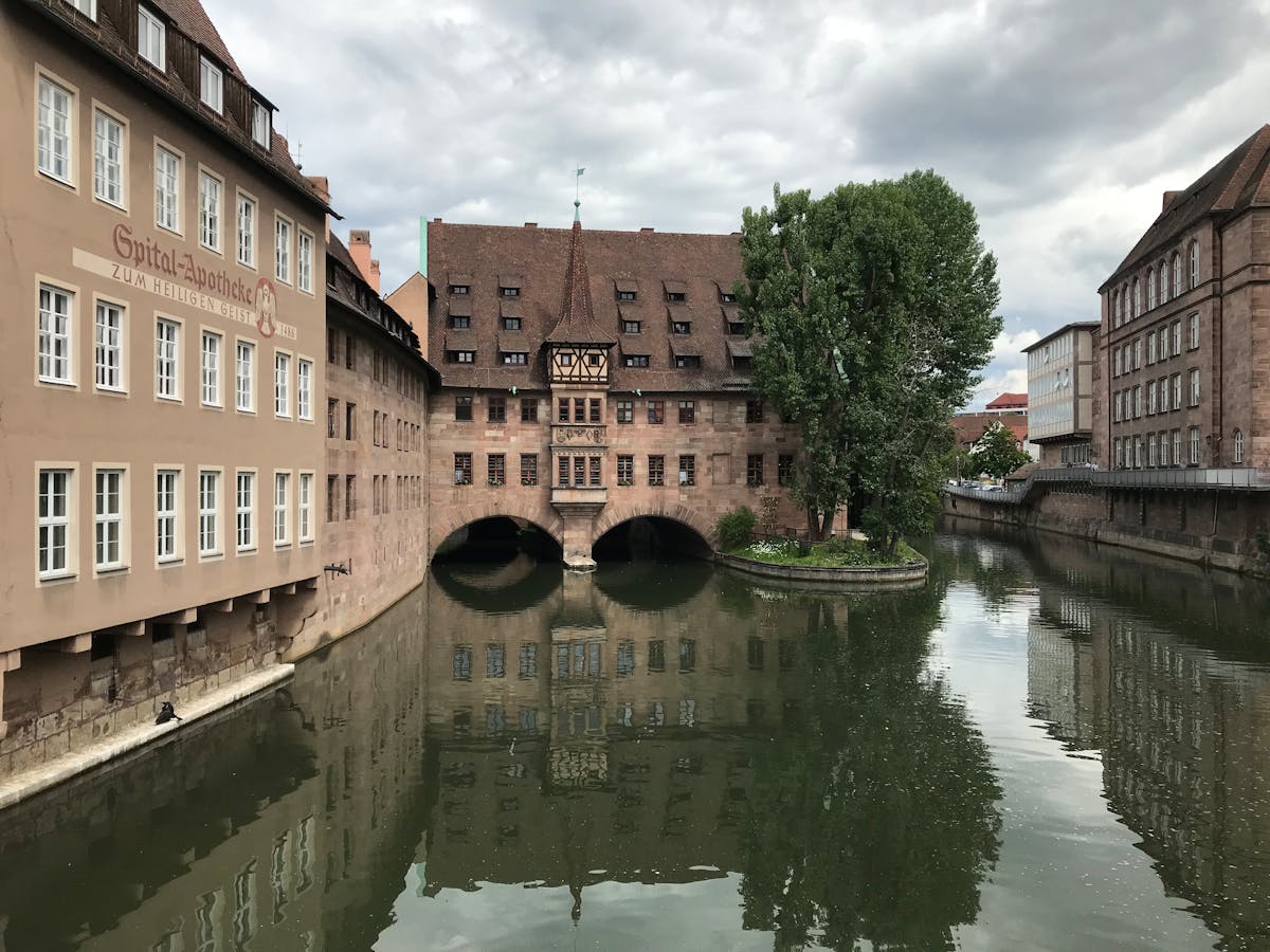 Heilig-Geist-Spital historic building by the Pegnitz River in Nuremberg Germany