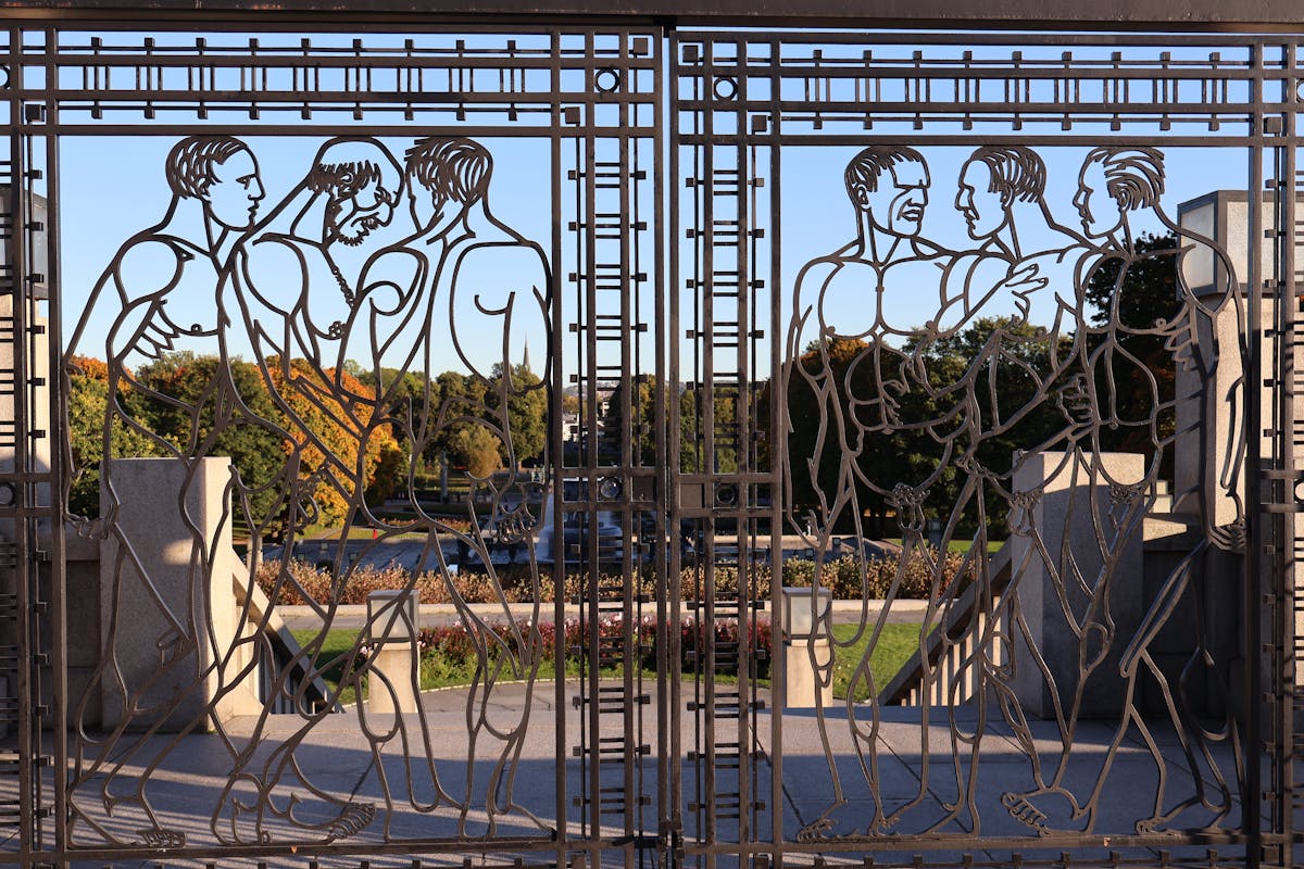 Artistic iron gate with human figures at Vigeland Park in Oslo
